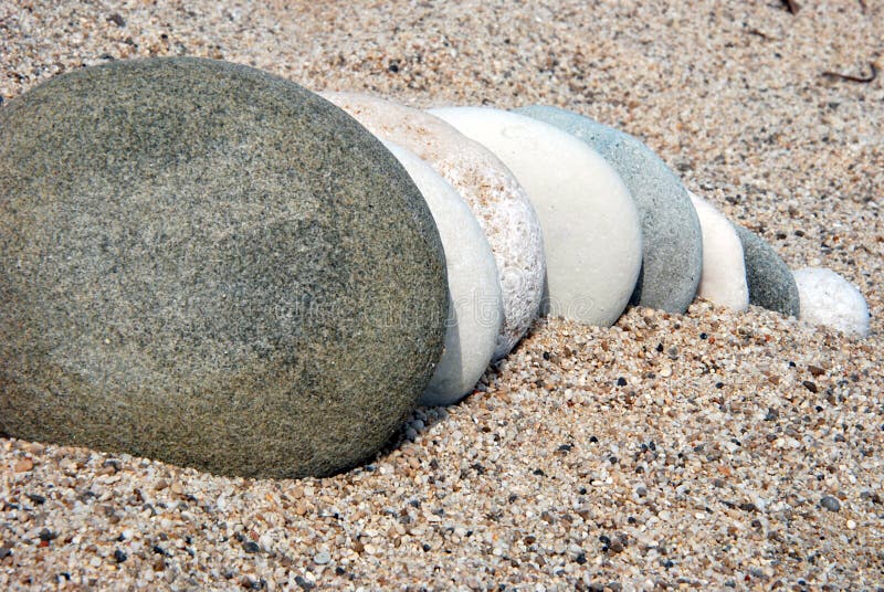 Stones in the sand stock image. Image of home, light - 14952673