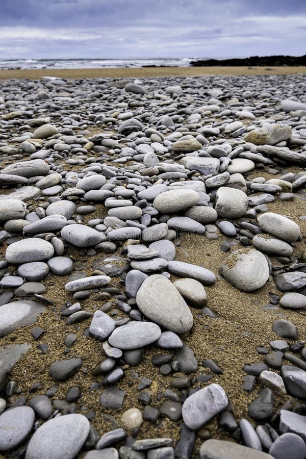 Stones in sand beach stock image. Image of scandinavia - 236716451