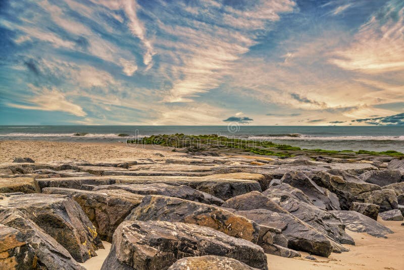 Stones in the Sand at the Shoreline Stock Image - Image of holiday ...
