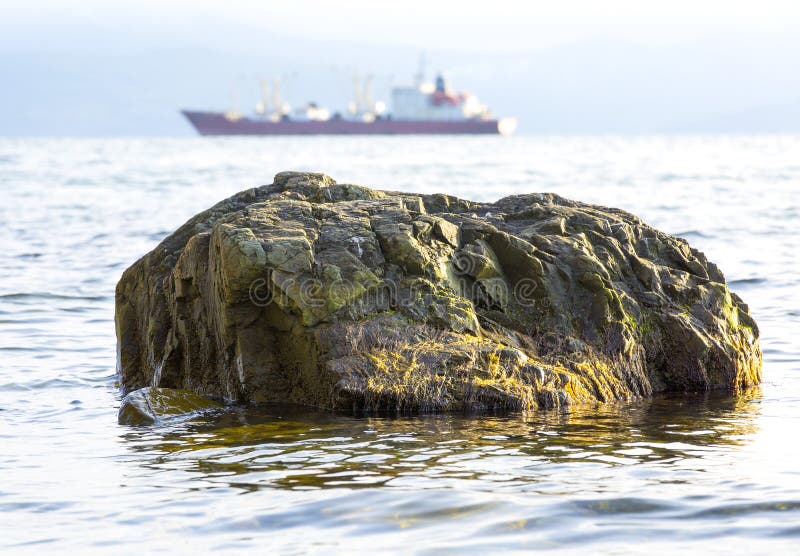 Stones on the Sea and Ships on the Background. Stock Image - Image of ...
