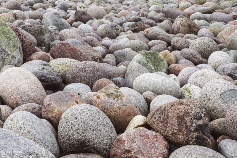 Stones on the seashore stock photo. Image of confront - 62788792
