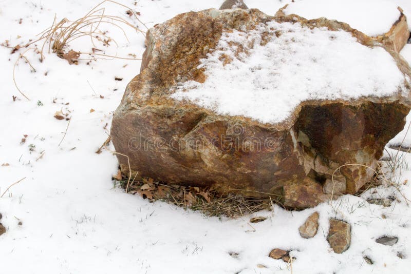 Stones in the Snow Along a Path with a Stone Wall Lining the River ...
