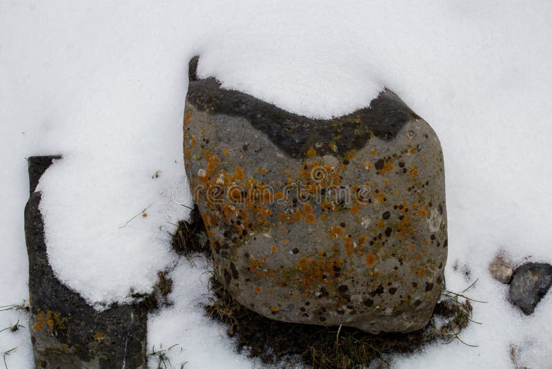 Stones in the Snow Along a Path with a Stone Wall Lining the River ...