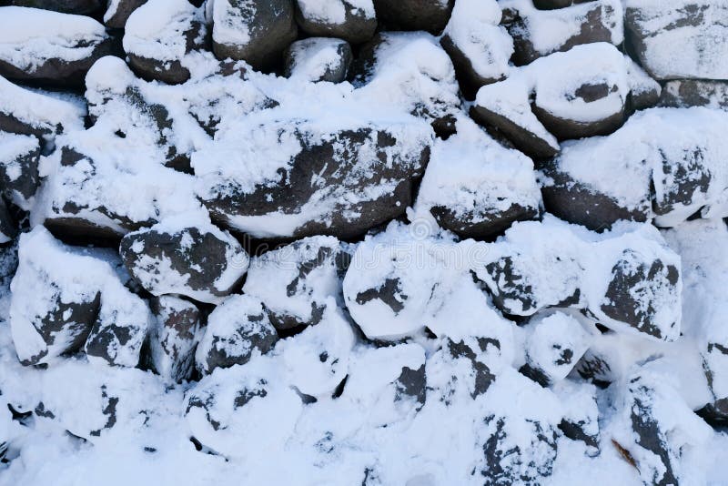 Stones in the Snow in Different Shapes and Sizes Stock Photo - Image of ...