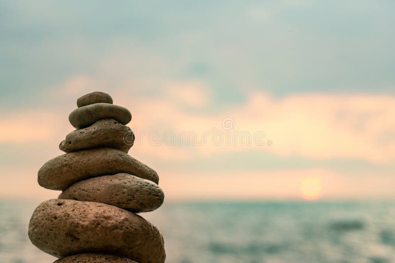 Stones Stack Beach Sunset - Balanced Stones Tower on a Beach with a ...