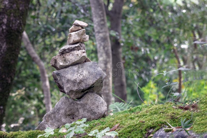 Stones Stacked in the Forest Stock Image - Image of stone, landscape ...