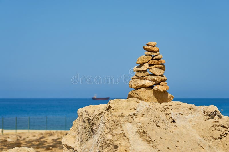 Stones Stacked on Top of Each Other with a Blurred Background. Stock ...