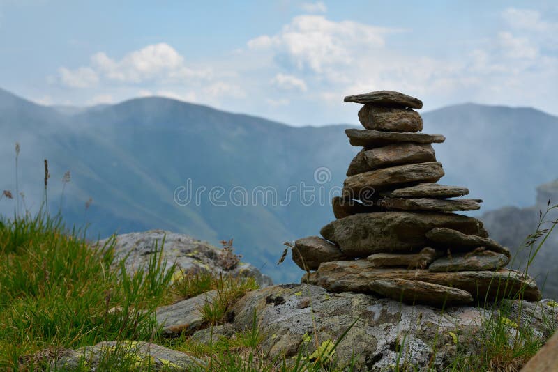 Stones Stacked on Top of Each Other on the Mountain Stock Photo - Image ...