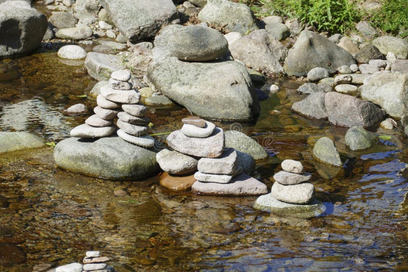 Stones Stacked on Top of Each Other in Stream Bed, Esoteric Exercise ...