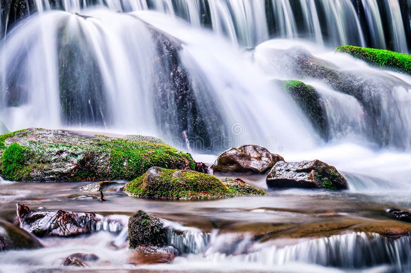 Stones under waterfall stock image. Image of area, blurred - 268942641