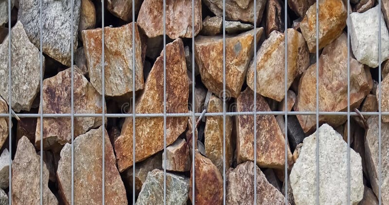 Stones of Various Sizes in the Wire Mesh Stock Footage - Video of ...