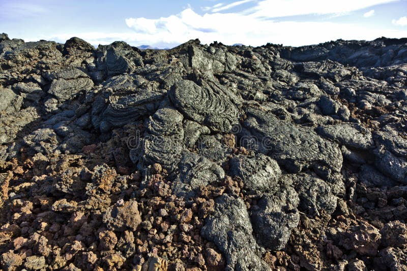 Stones of volcanic flow stock image. Image of detail - 18076945