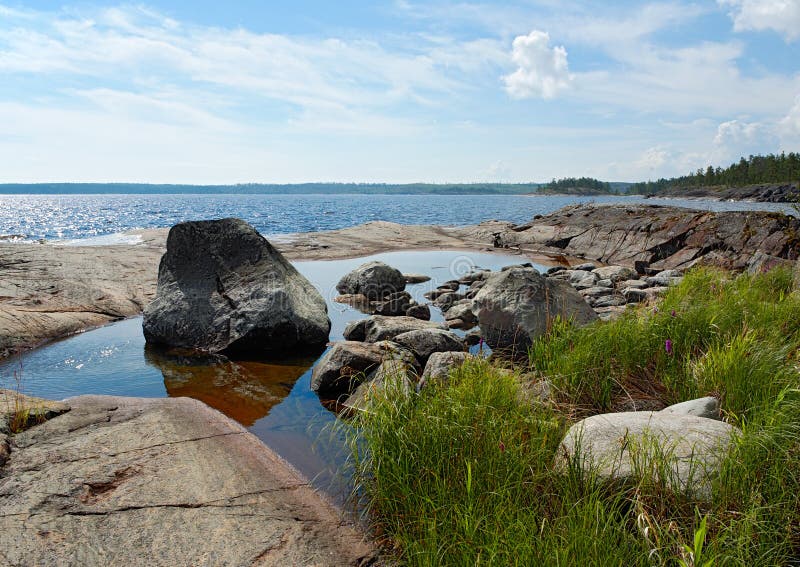 Stones in water stock photo. Image of blue, season, coast - 11955468