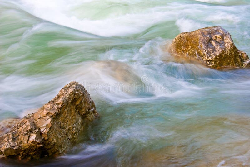 Stones in a water stock photo. Image of liquid, motion - 12505846