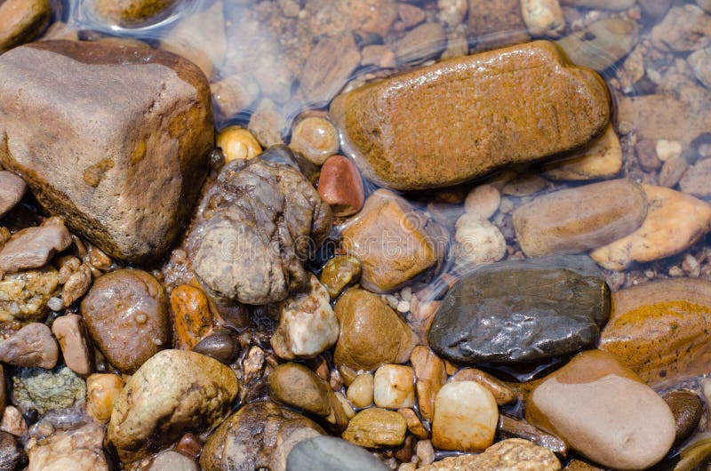 Stones in Water on Riverside. Stock Photo - Image of riverbank, pebble ...