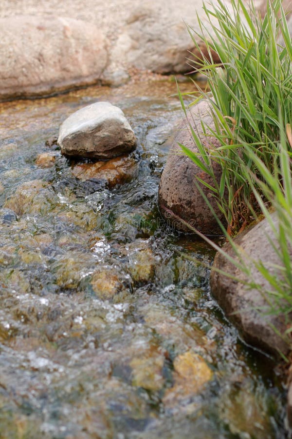 Stones in water stream. stock photo. Image of environment - 73557548