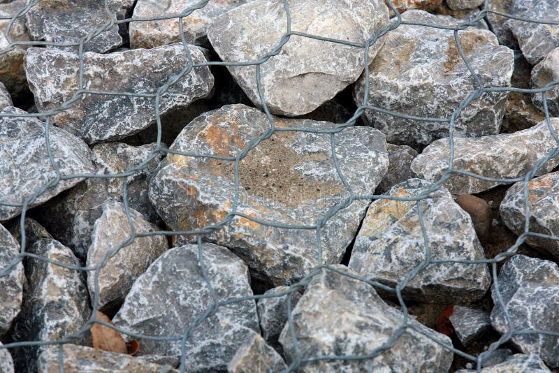 Stones in the wire stock image. Image of seamless, geology - 35547763