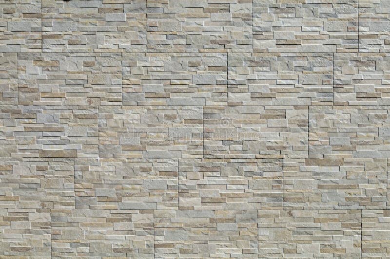 Grey Stone Wall Cladding Made of Strips and Square Blocks Stacked ...