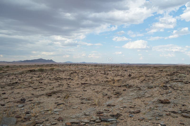 Stony Desert with Mountains in Namibia Stock Photo - Image of stone ...