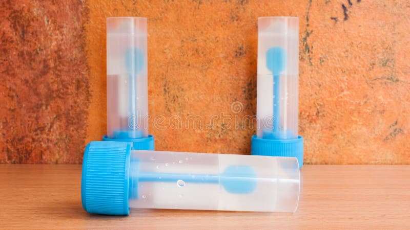 Stool Sample Jars with Transport Medium Stock Photo - Image of sample ...
