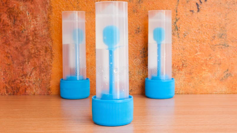 Stool Sample Jars with Transport Medium Stock Photo - Image of ...