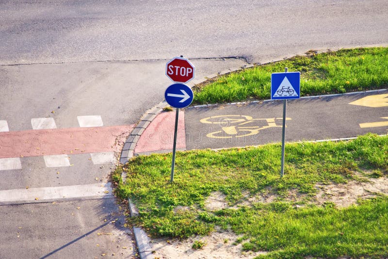 Stop, Arrow and Bicycle Lane Signs Stock Photo - Image of bicycle ...