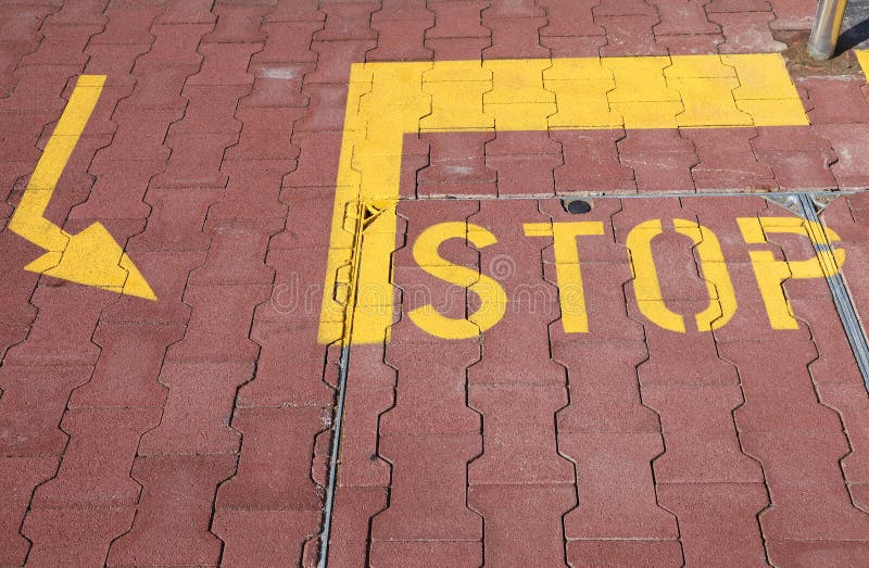 Stop and Arrow Sign at the Road Crossing Stock Image - Image of stop ...