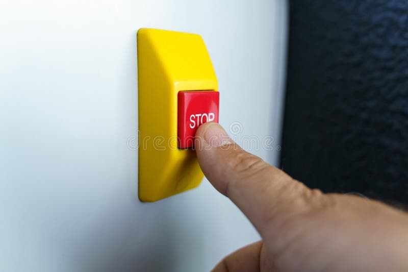 Stop Button and the Hand of a Worker about To Press it. Stock Photo ...