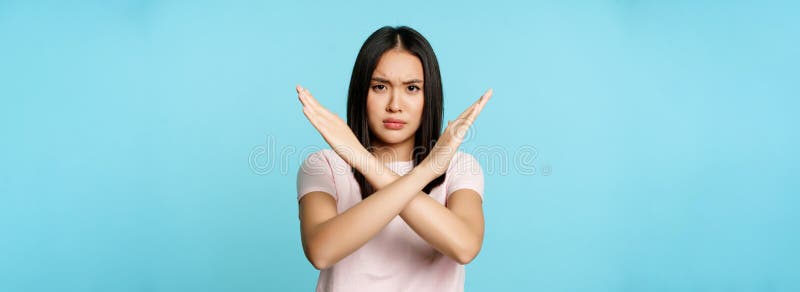 Stop Concerned Asian Woman Showing Cross Sign Saying No Raise Awareness Standing Over Blue