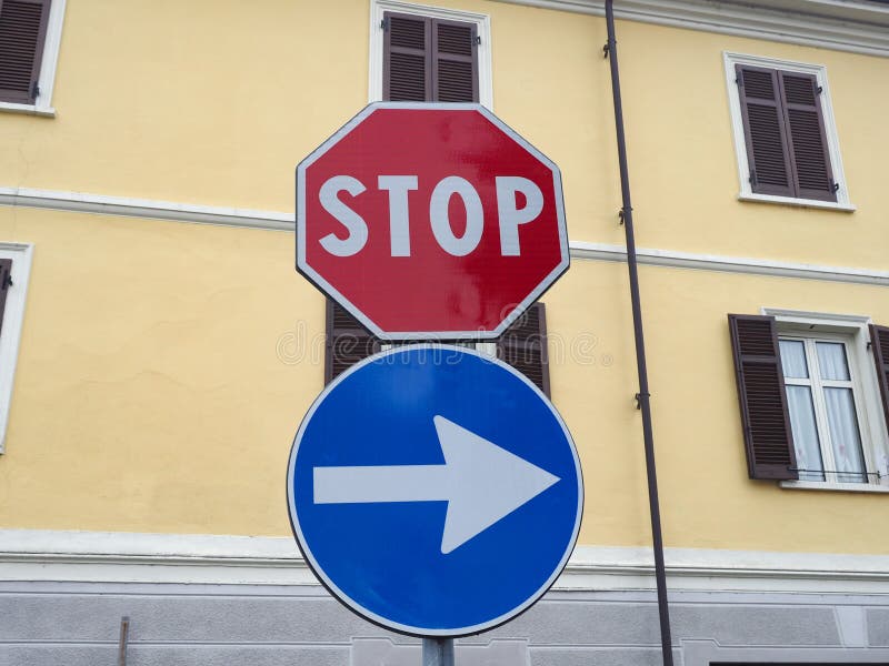 Stop and direction sign stock photo. Image of street - 164373496