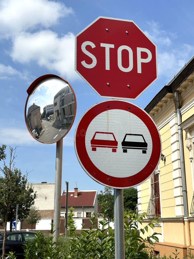 Stop and Do Not Overtaking Sign at the Road Crossing Stock Image ...
