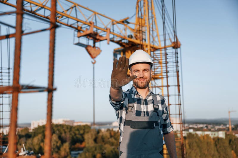 Stop Gesture by the Hand. Man is Working on the Construction Site at ...