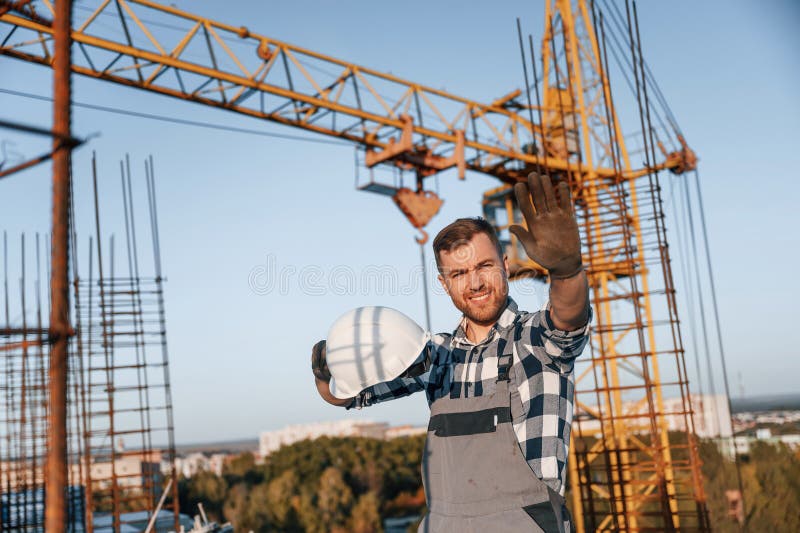 Stop Gesture by the Hand. Man is Working on the Construction Site at ...