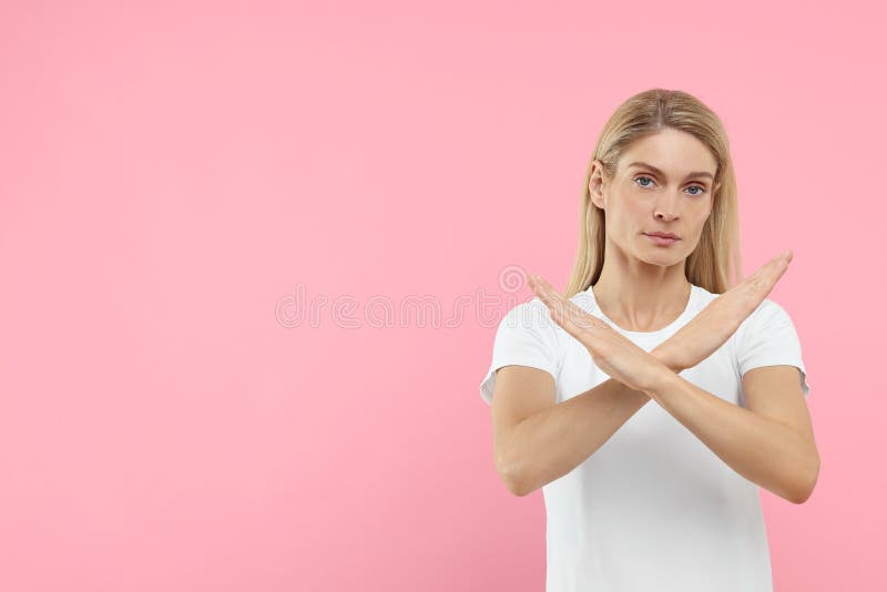 Stop Gesture. Woman with Crossed Hands on Pink Background, Space for ...