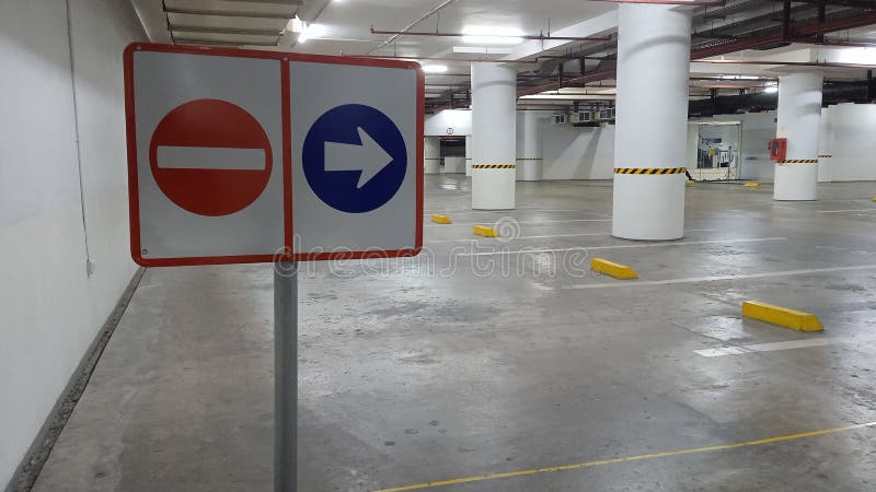 Stop and Go Traffic Sign in a Parking Area Stock Photo - Image of ...