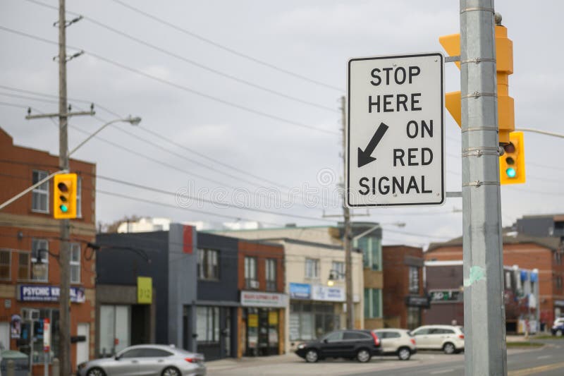 Stop Here on Red Signal Sign Editorial Photo - Image of sidewalk ...