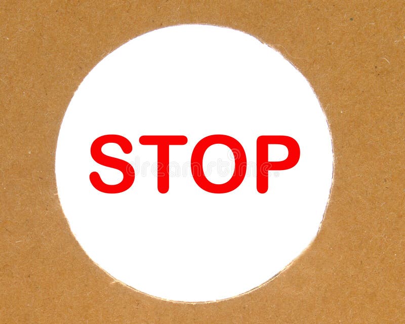 STOP Lettering in a Round Paper Hole on a White Background Stock Photo ...