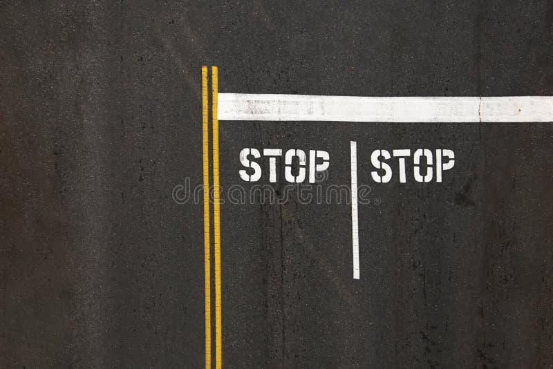 Stop Lines in the Middle of a Road Stock Image - Image of acronym ...