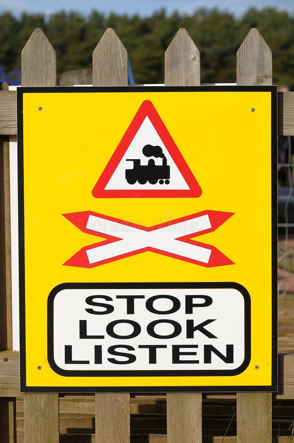Stop, Look, Listen Sign at a Railway Crossing Stock Photo - Image of ...