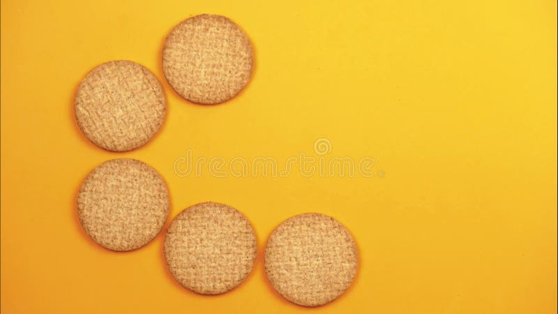 Stop Motion Animation with Five Biscuit on Orange Background Stock ...