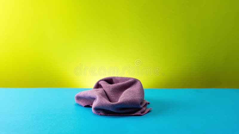 Stop Motion Animation of Pile Clothes on Blue Table Seamless Loop Video ...