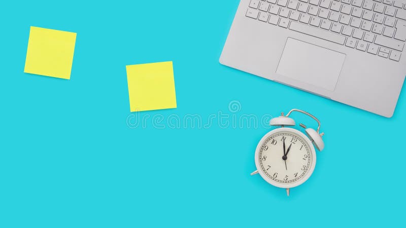 Stop Motion of a Laptop, Clock and Sticky Notes on a Blue Background, a ...