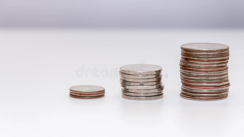 Stop Motion Reduces a Stack of Coins on a White Background, Camera ...