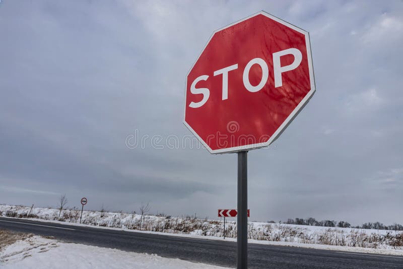 Stop Road Sign in Snowy Day in Winter Stock Photo - Image of snow ...