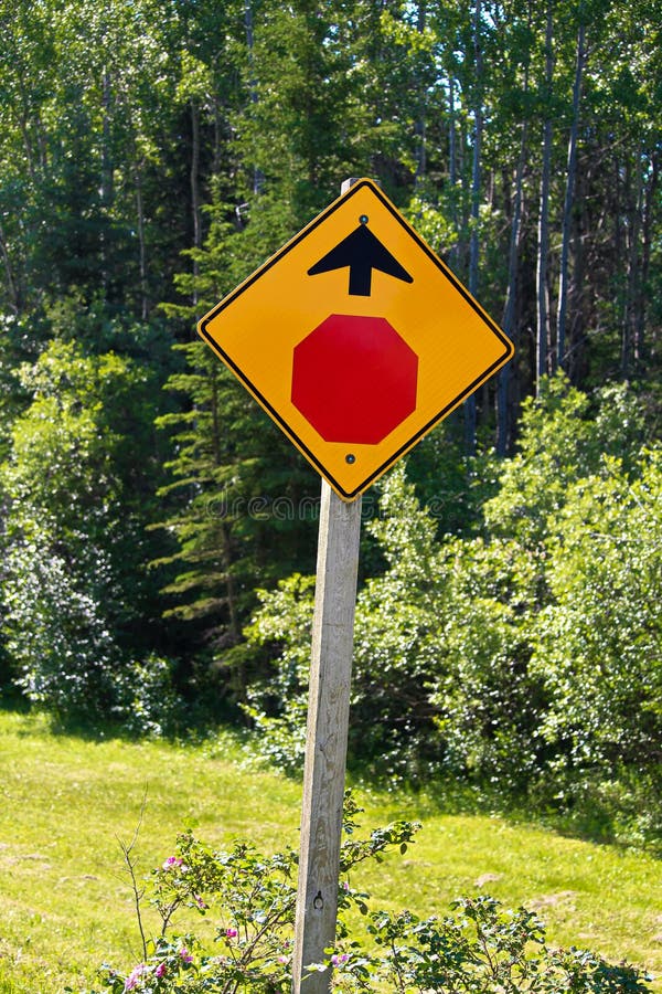 A Stop Sign Ahead Sign with Trees in the Background Stock Image - Image ...