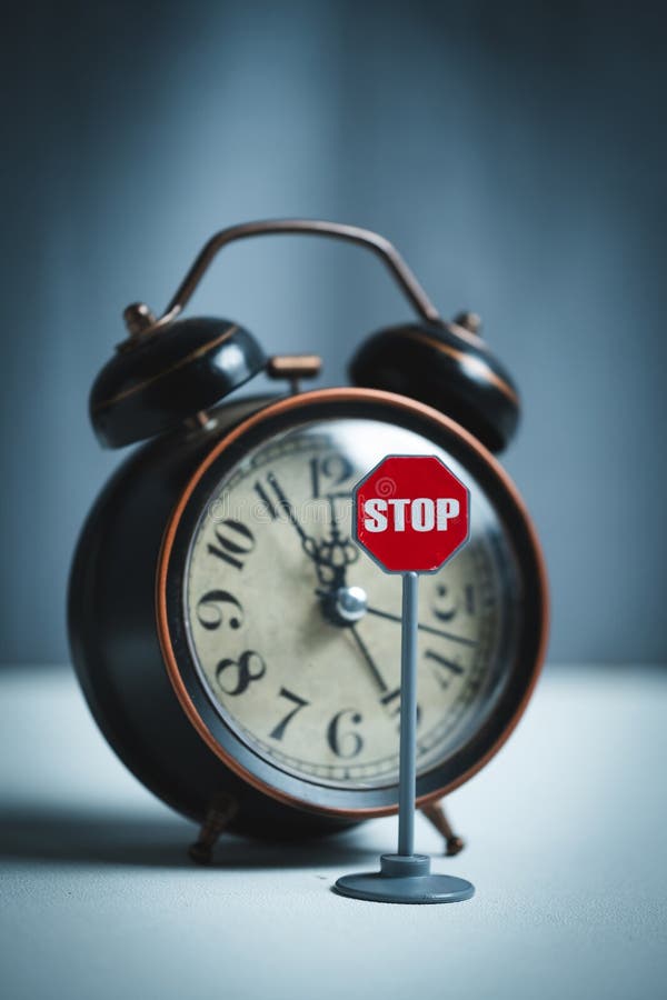 Stop Sign and Alarm Clock. Stop Time Concept Stock Image - Image of ...