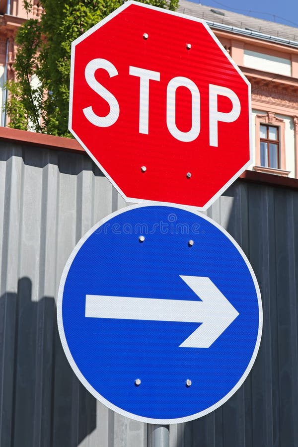 Stop Sign and Light Next To the Smoke Stack of the Power Station Stock ...