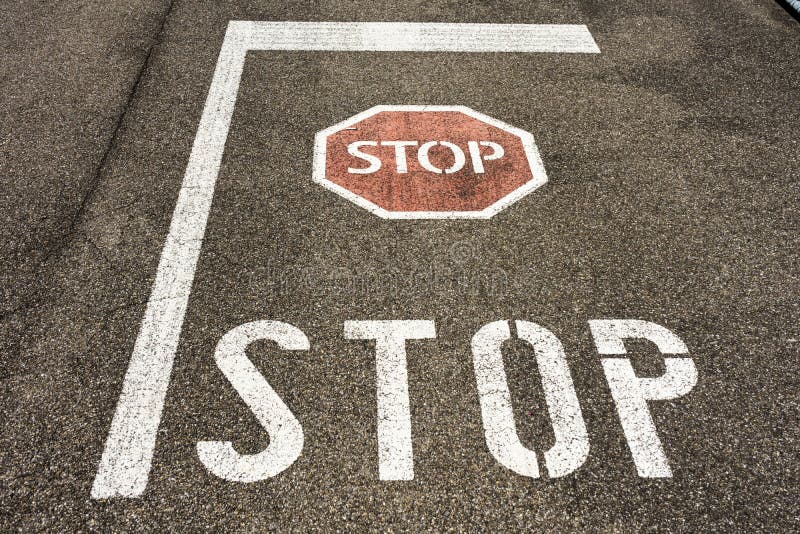 Stop Sign on City Asphalt Floor with Symbol Stock Photo - Image of ...