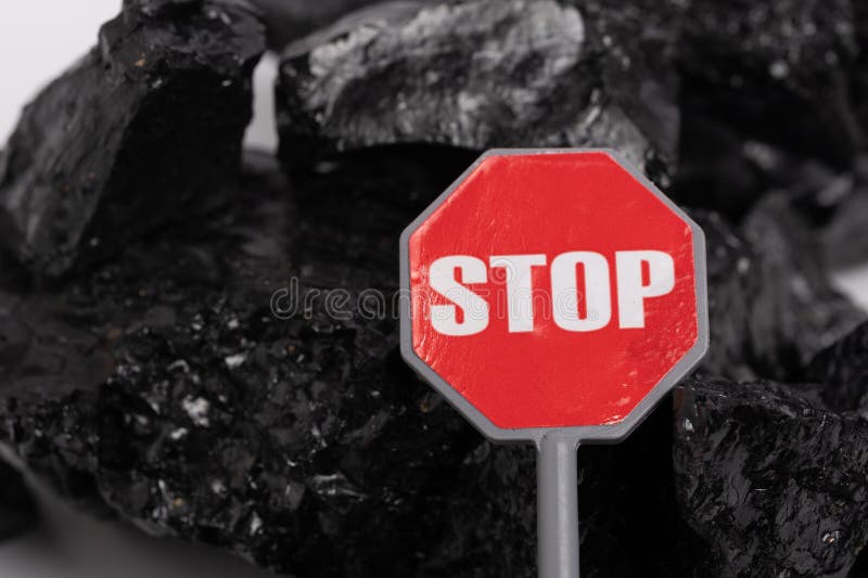 Stop Sign on Coal Background. Conceptual Image of Danger and Caution ...
