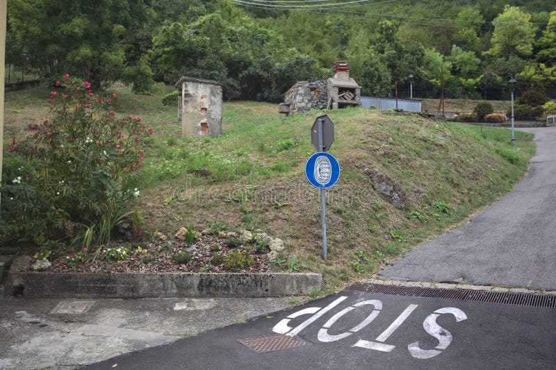 Stop sign on a crossroad stock image. Image of architecture - 339150541
